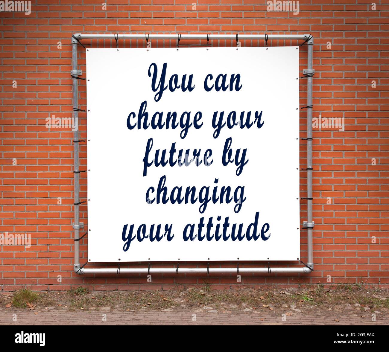 Large banner with inspirational quote on a brick wall Stock Photo - Alamy