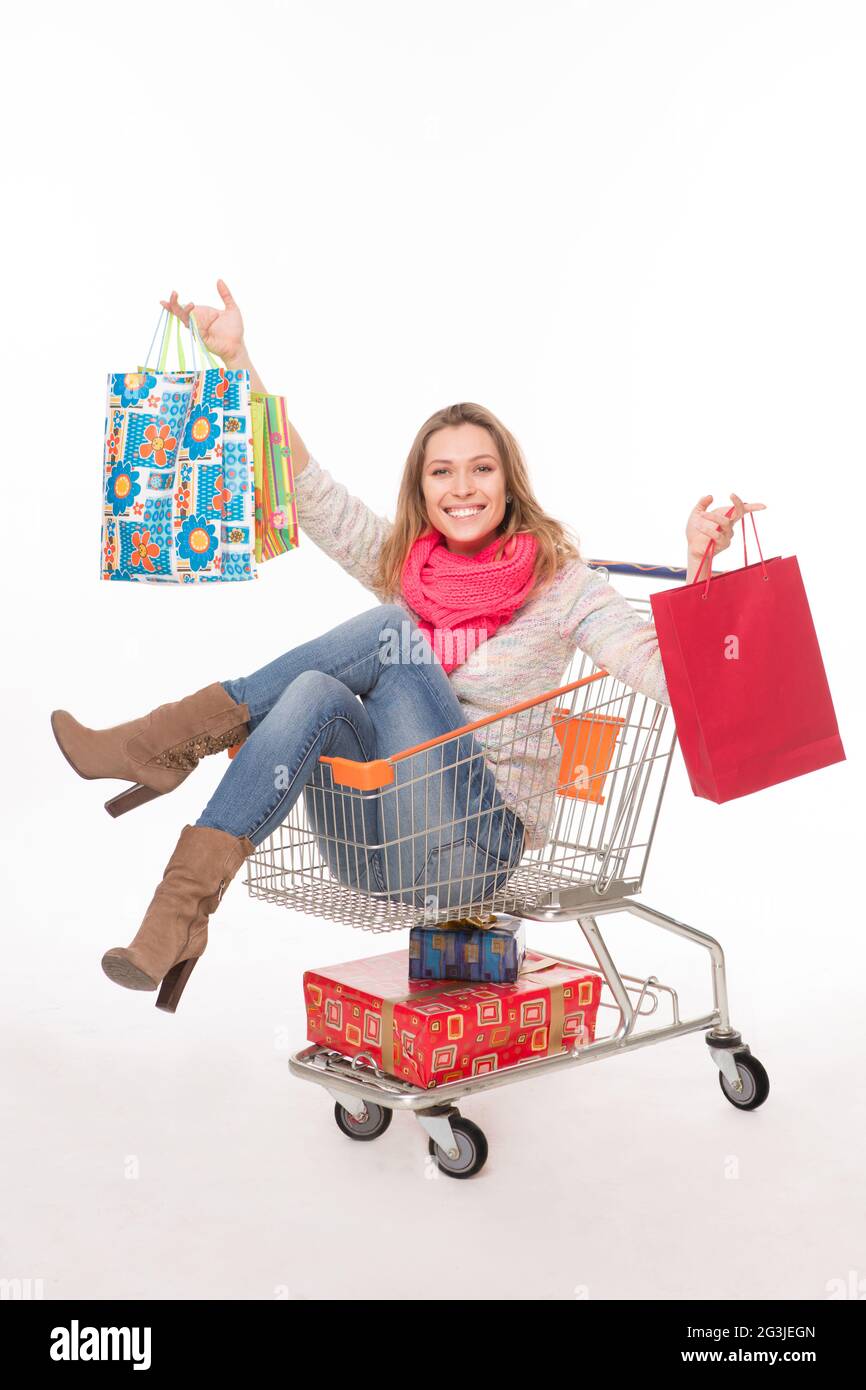 Woman in shopping cart hi-res stock photography and images - Alamy