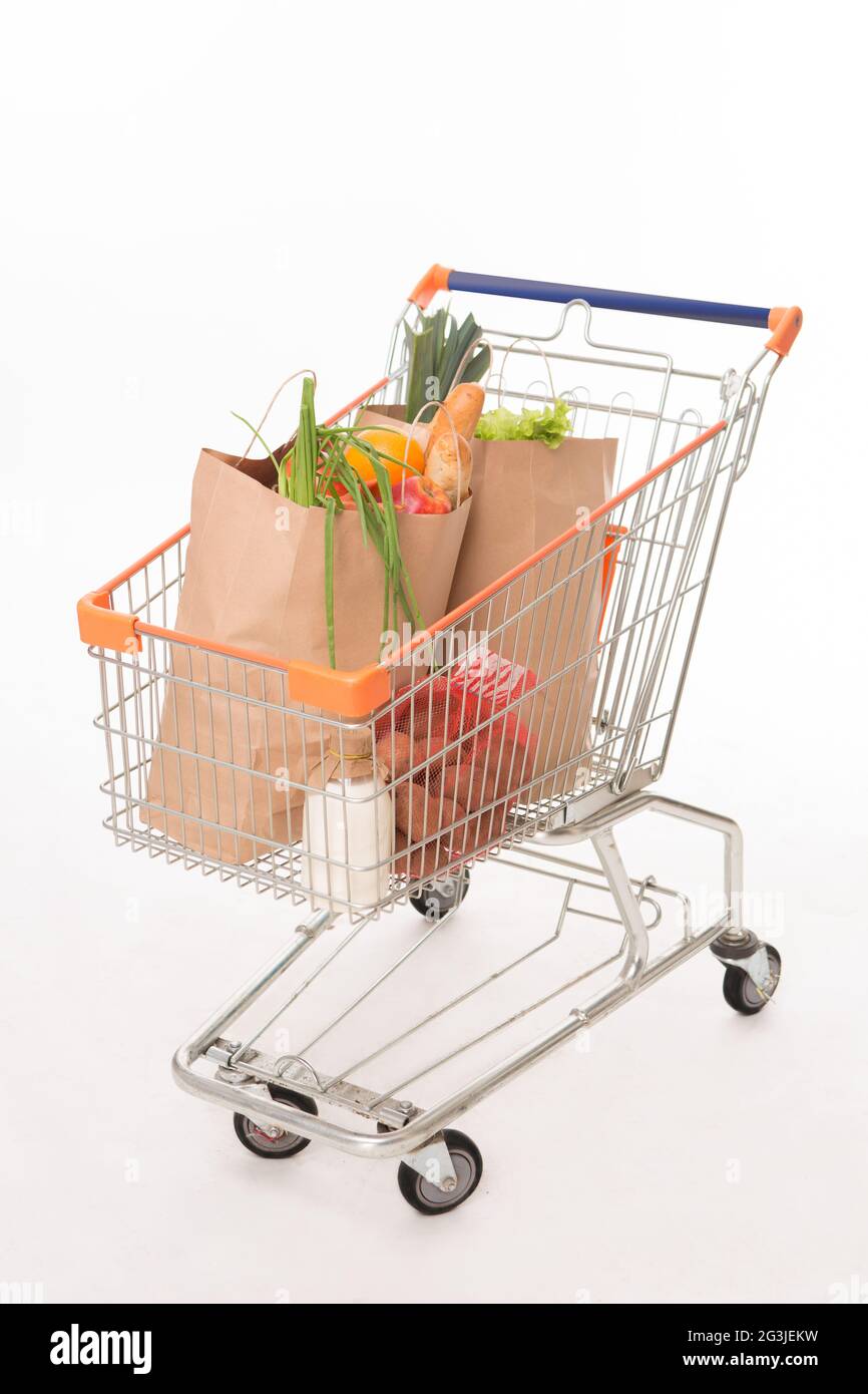 Shopping cart with shopping bags Shopping cart with shopping bags Stock ...