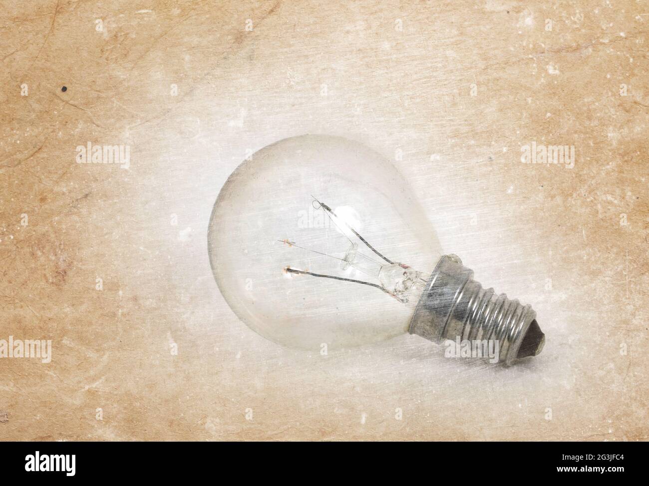 Old lightbulb isolated on a white background Stock Photo - Alamy