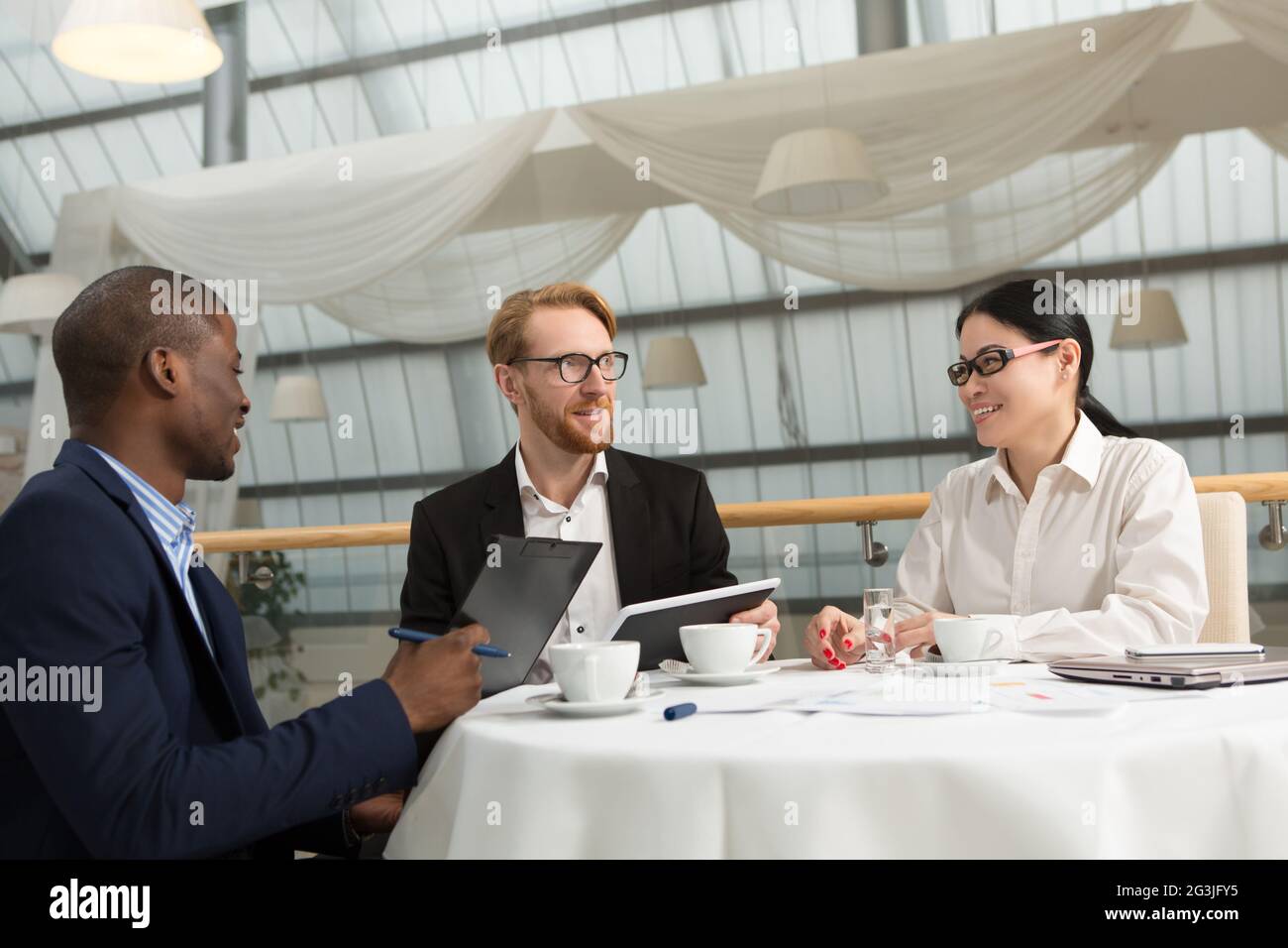Business meeting in restaurant Stock Photo - Alamy