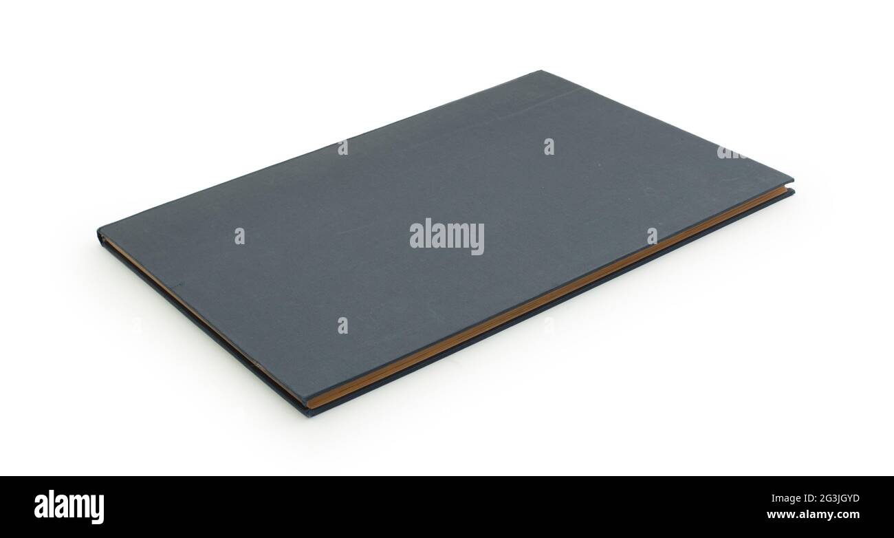 Closed old book isolated Stock Photo - Alamy