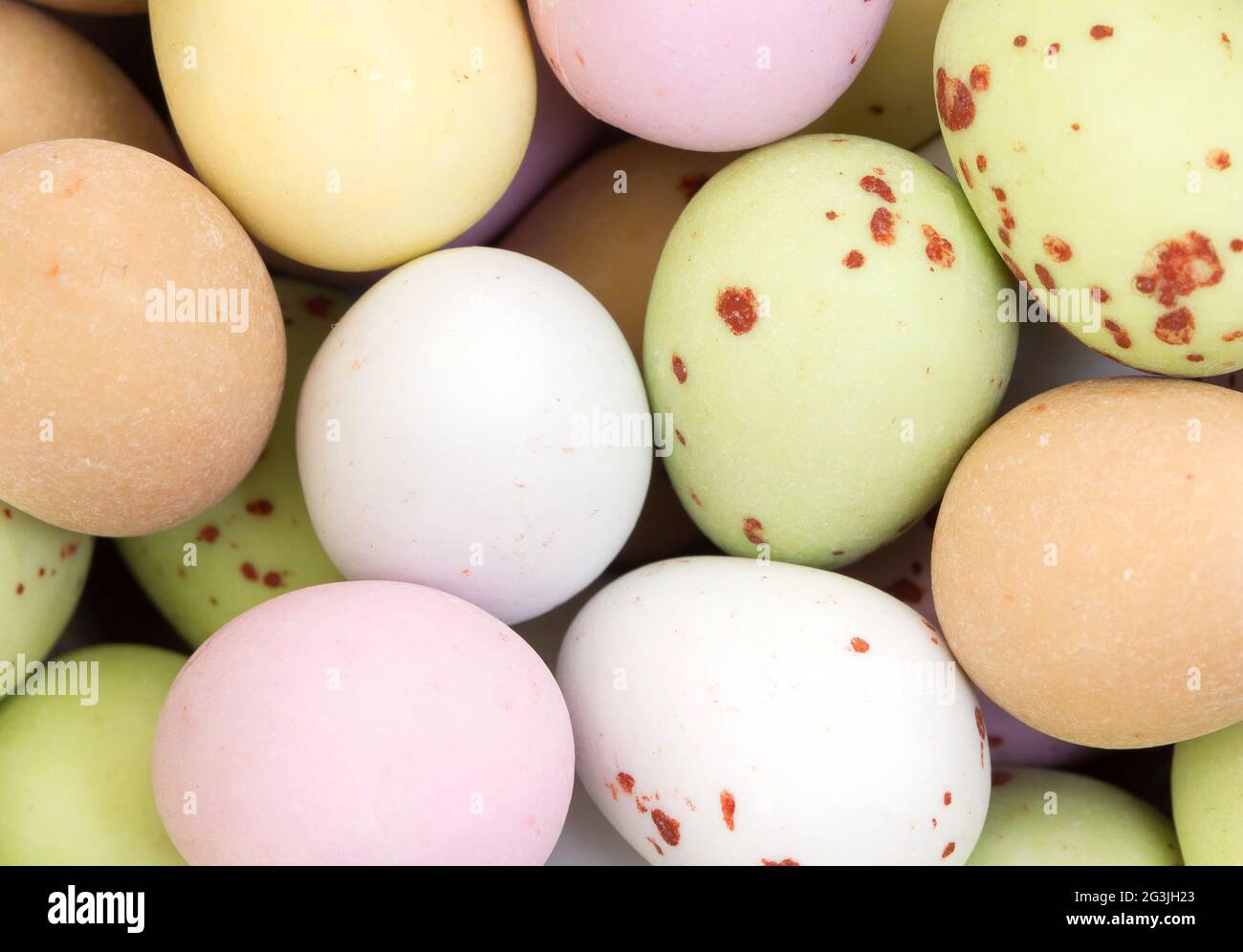 Assorted colorful chocolate easter eggs isolated Stock Photo - Alamy