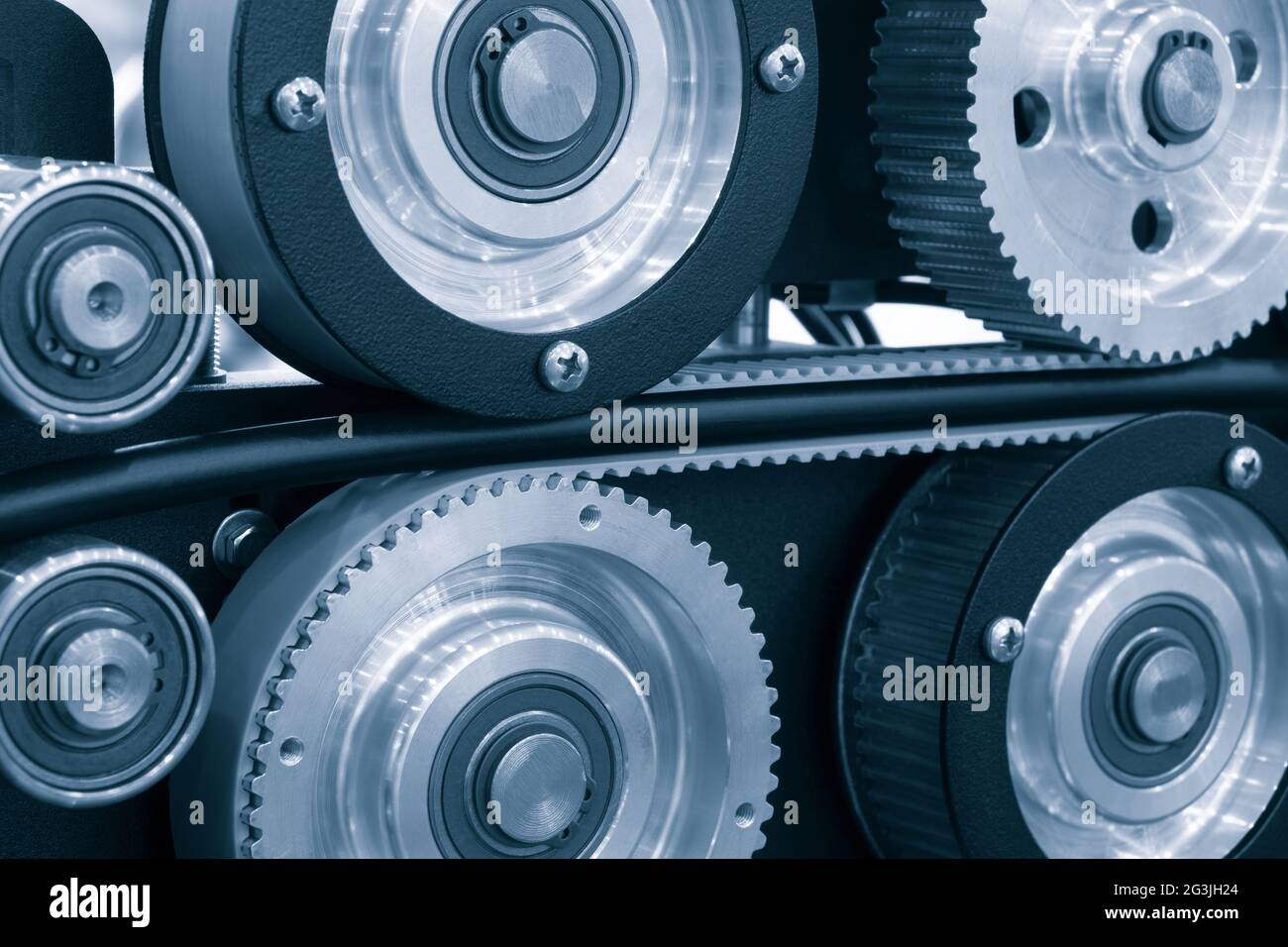 Belt drive system, industrial transport concept Stock Photo - Alamy