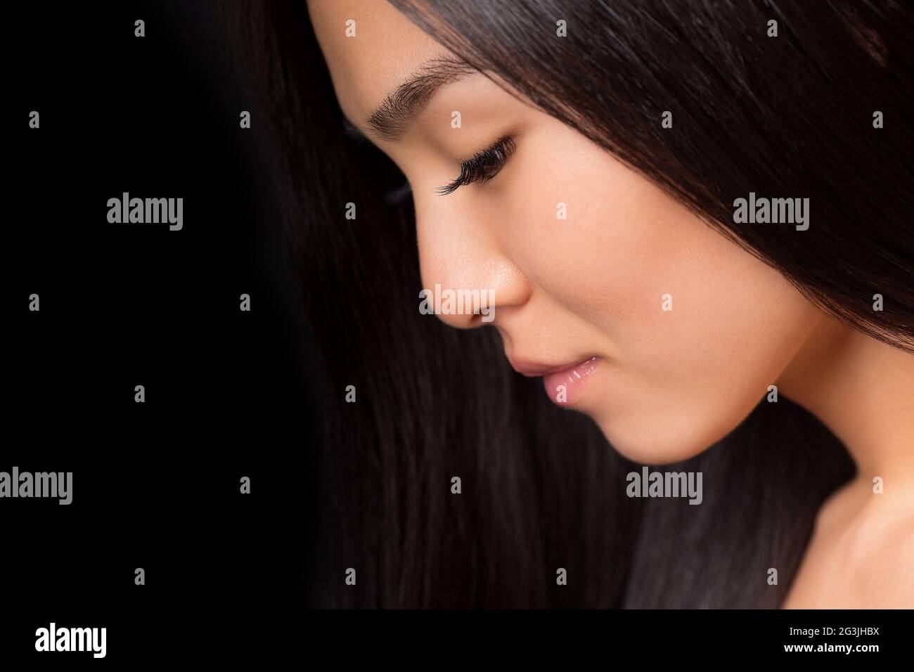 Close-up profile of asian lady in studio Stock Photo - Alamy