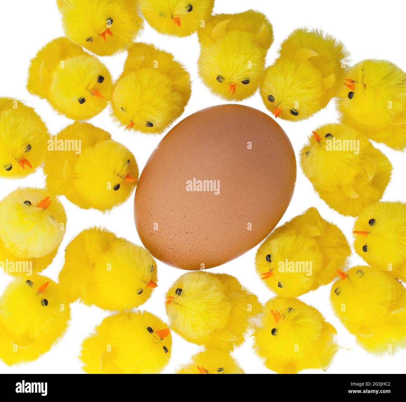 Easter chicks surrounding a large egg Stock Photo - Alamy