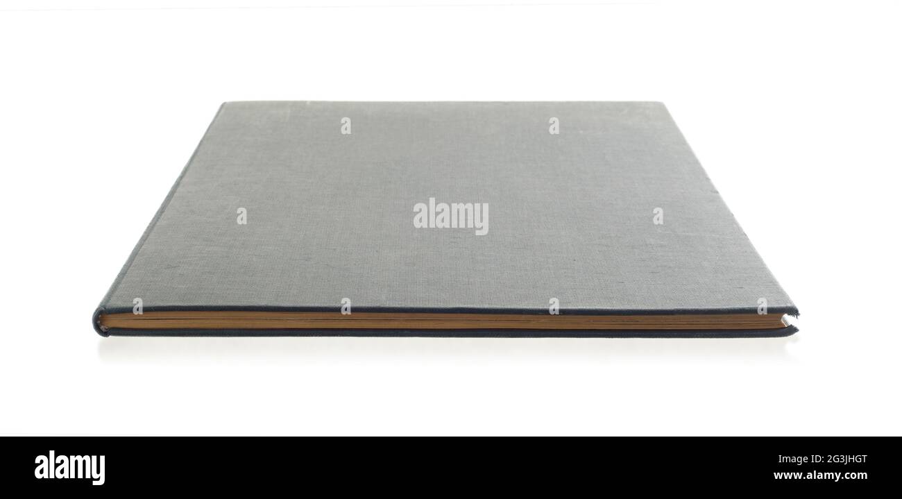 Closed old book isolated Stock Photo - Alamy