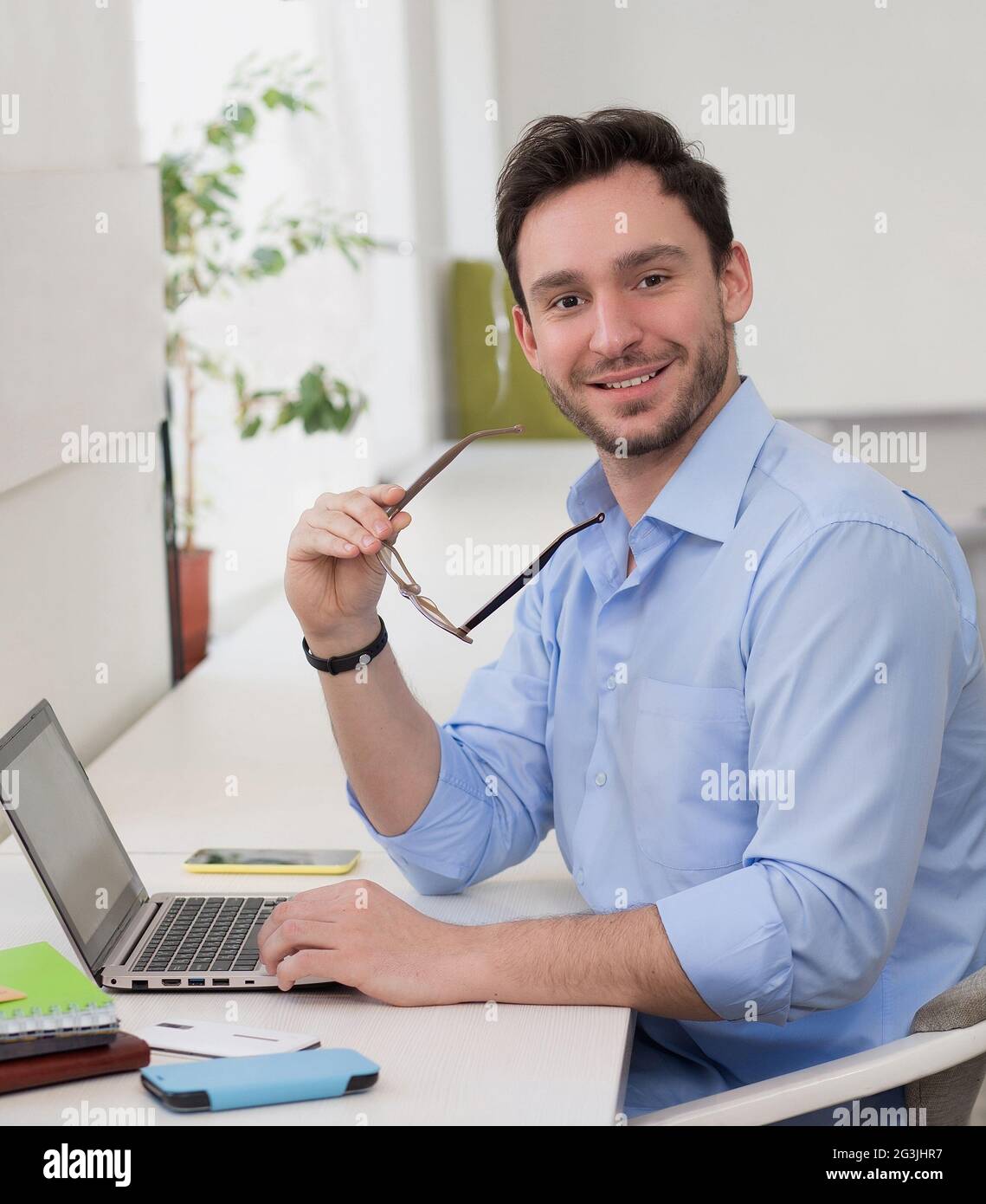 Male freelancer smiling using hi-res stock photography and images - Alamy