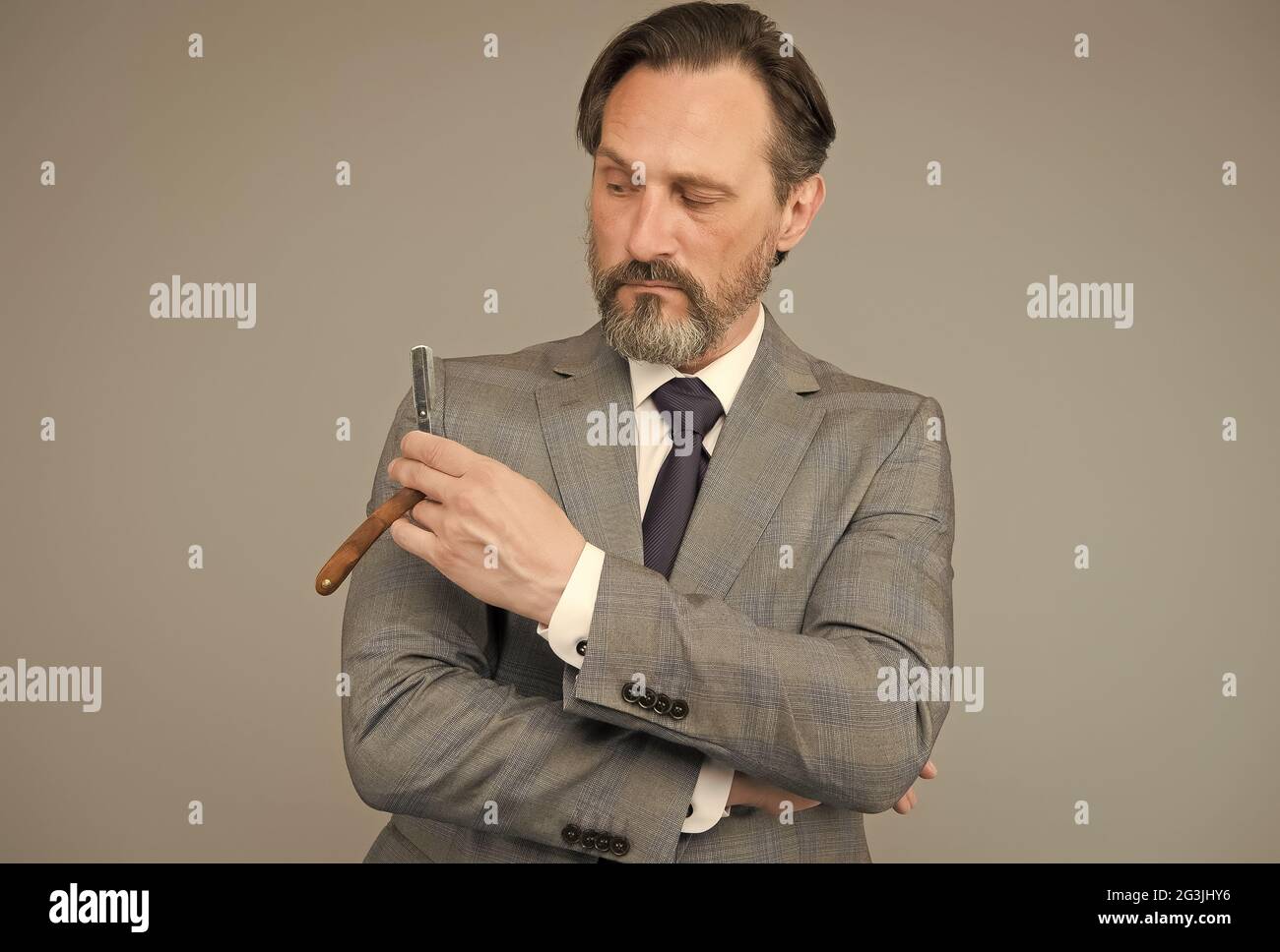 Man shaving straight razor grooming beard, barbershop salon concept ...