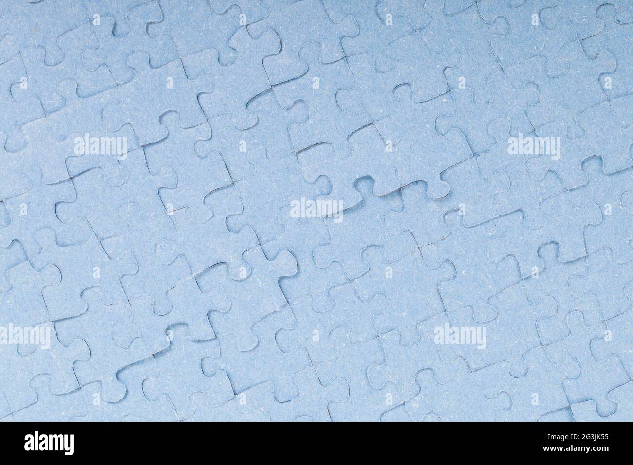 Connected blue puzzle pieces isolated Stock Photo - Alamy