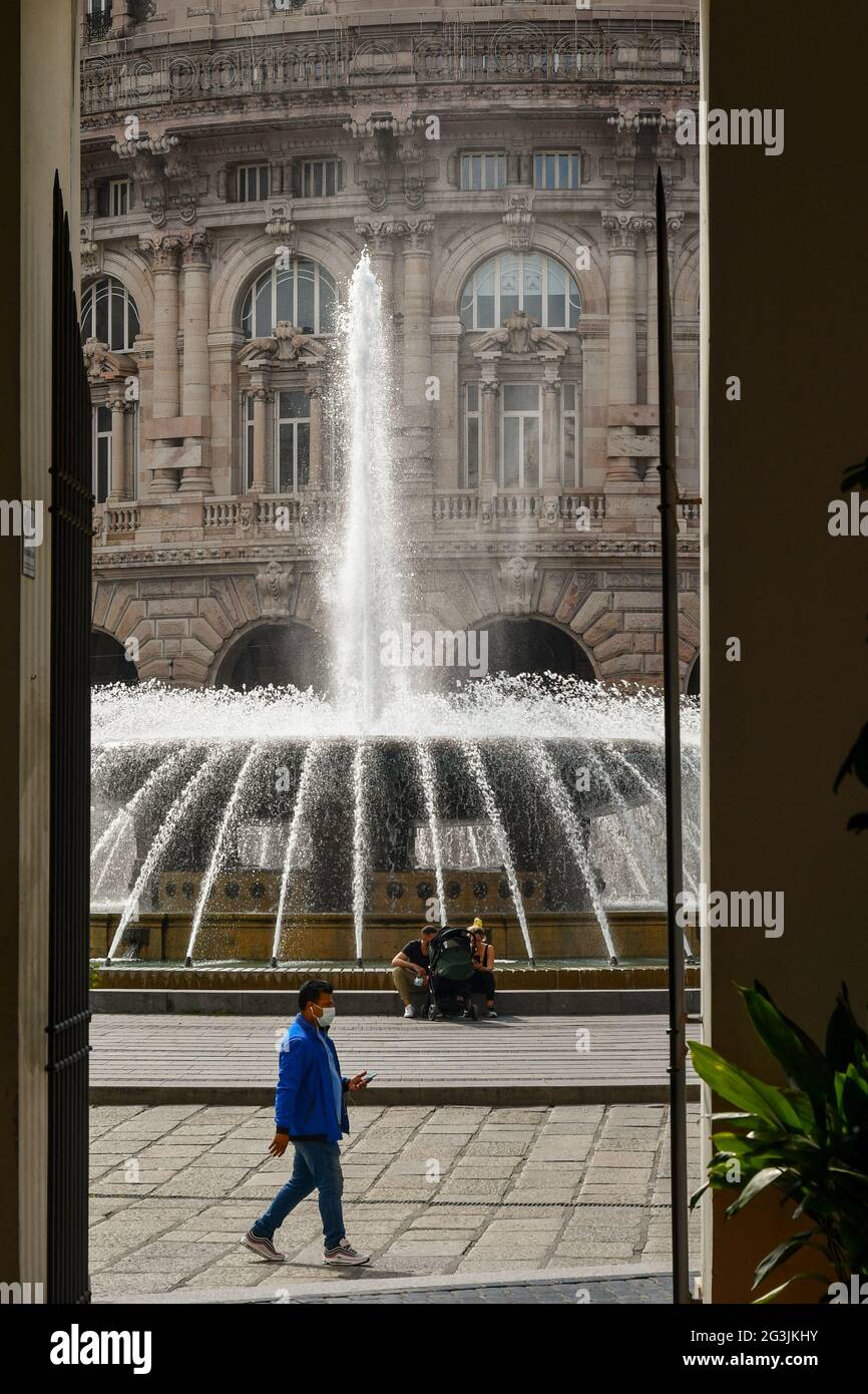Glimpse of Piazza De Ferrari, Genoa's main square, with the bubbling ...