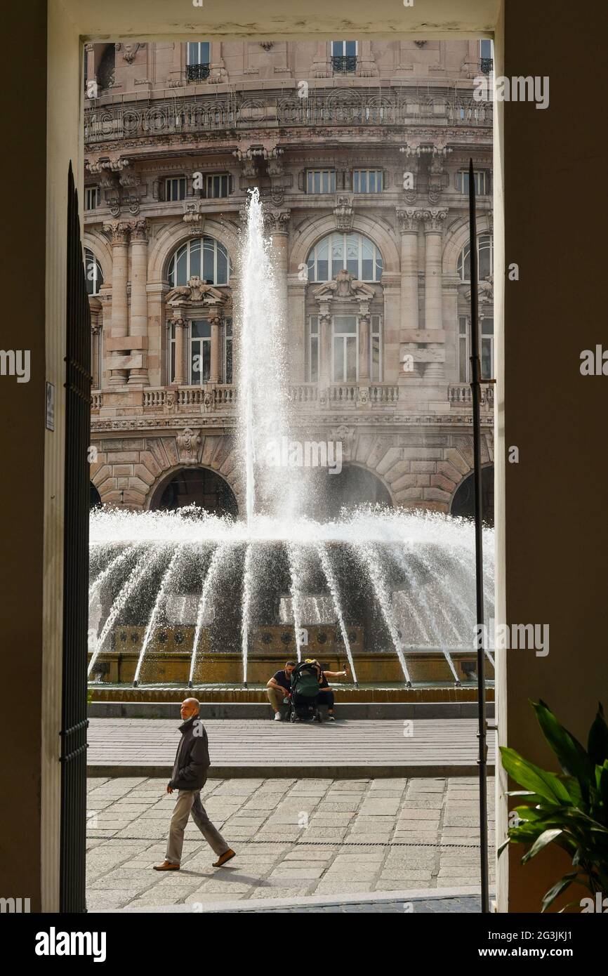 Glimpse of Piazza De Ferrari, Genoa's main square, with the bubbling ...
