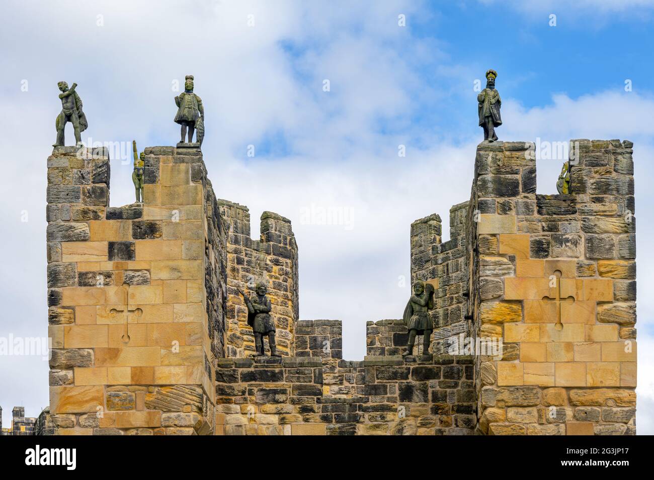 ALNWICK, ENGLAND - JUNE 10th, 2021: Statues of warriors on the top of ...