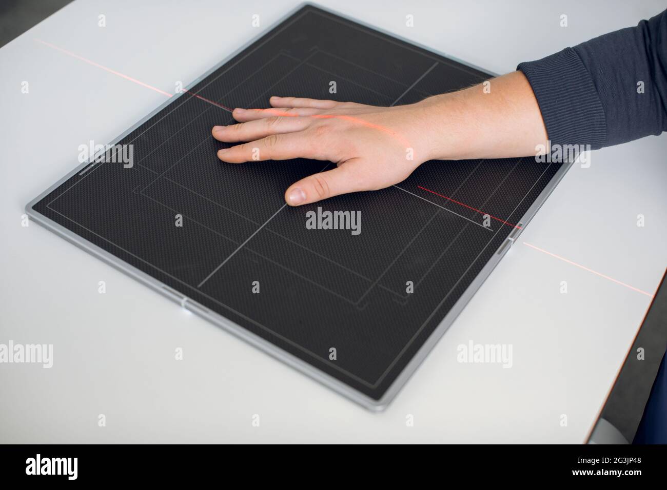 X-ray of human hand, palm and wrist. Radiology concept. Close up of ...