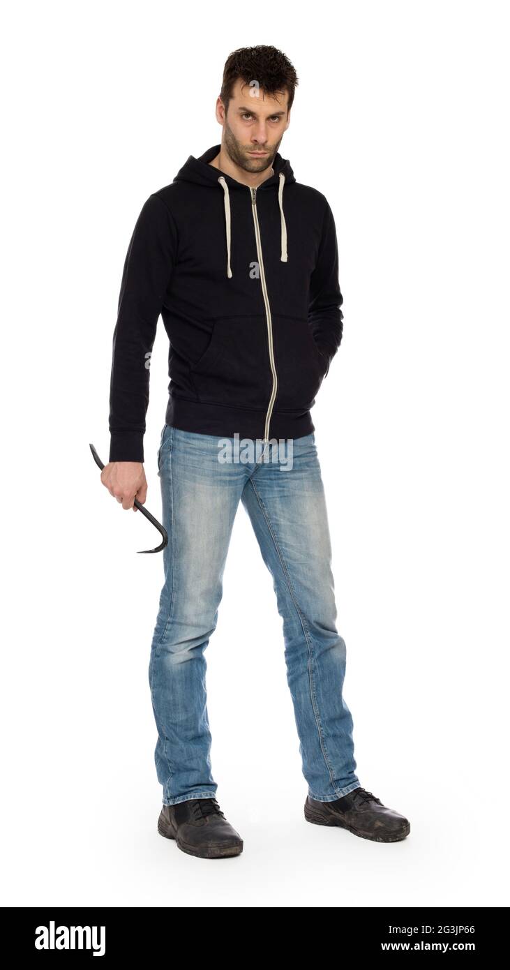 Crime concept. Criminal in hood with crowbar in hand Stock Photo - Alamy
