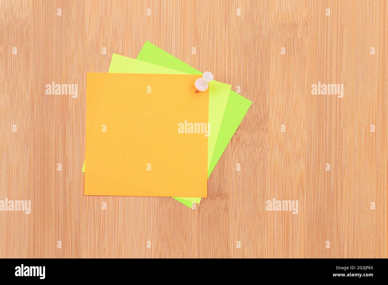 Colored Sticky Notes with Copyspace Pinned to the Wooden Message Board ...
