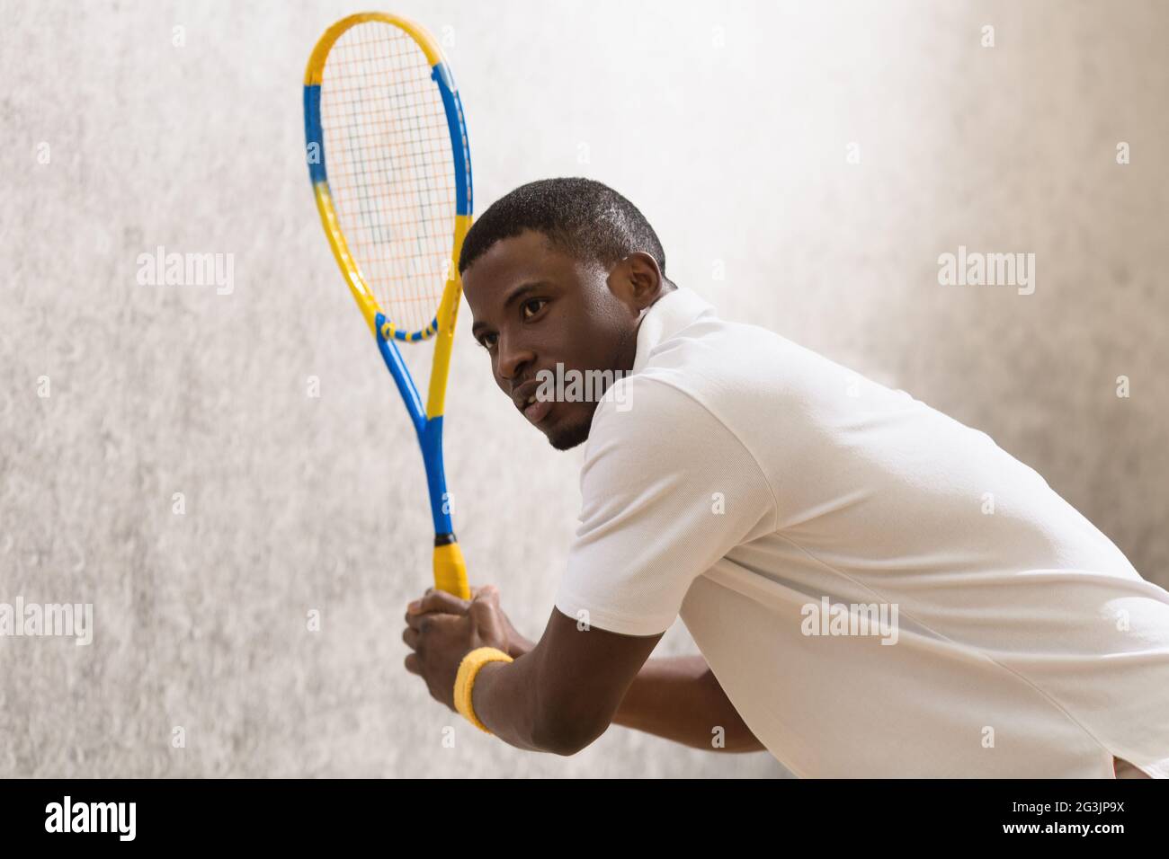 Squash player man Stock Photo - Alamy