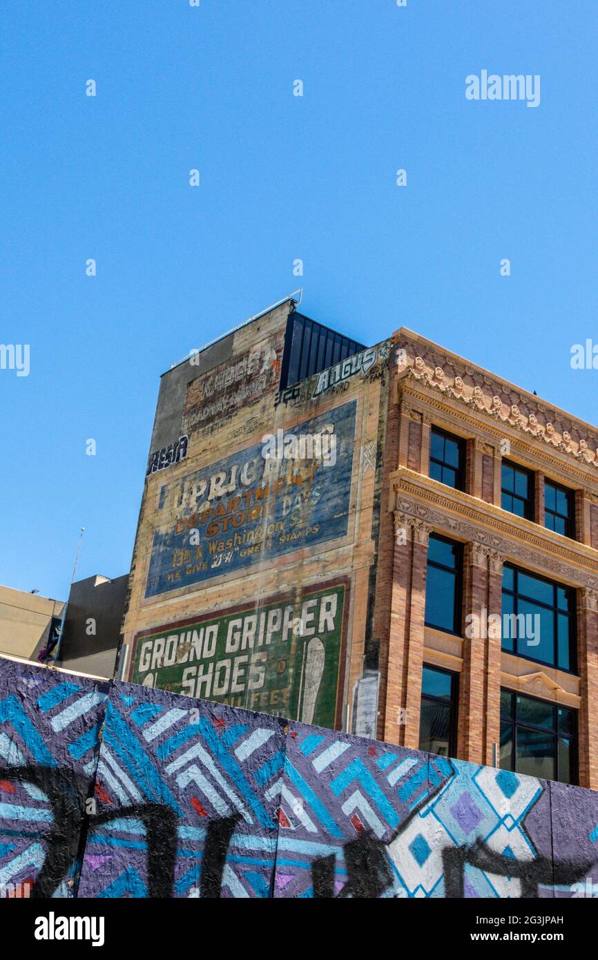 antique advertising on an old brick building in Oakland California USA ...