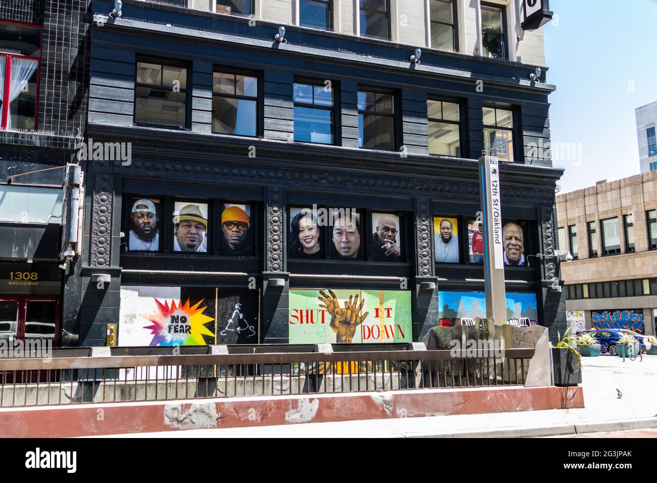 A building with photos of people of diverse racial background in ...