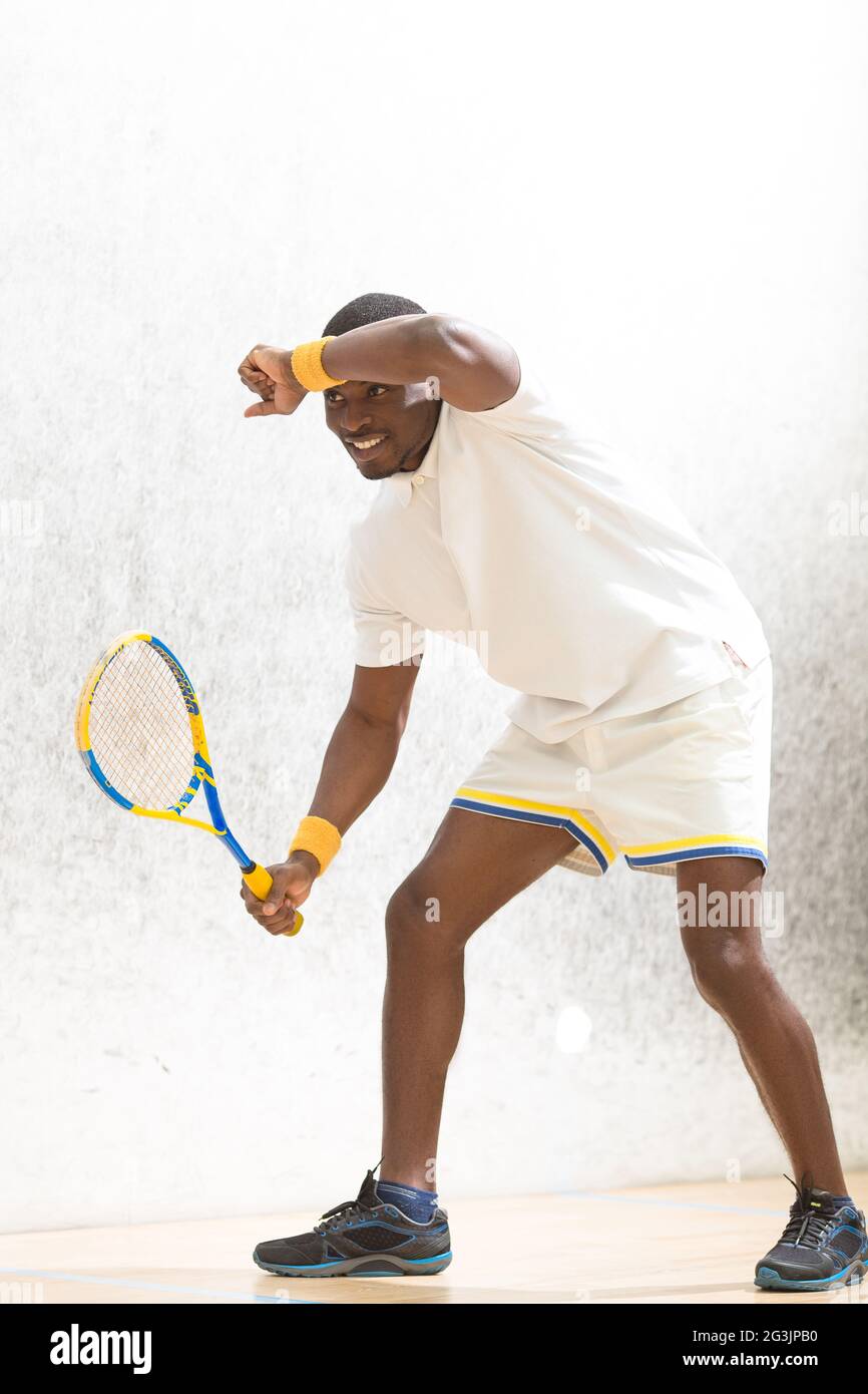 Squash player man Stock Photo - Alamy