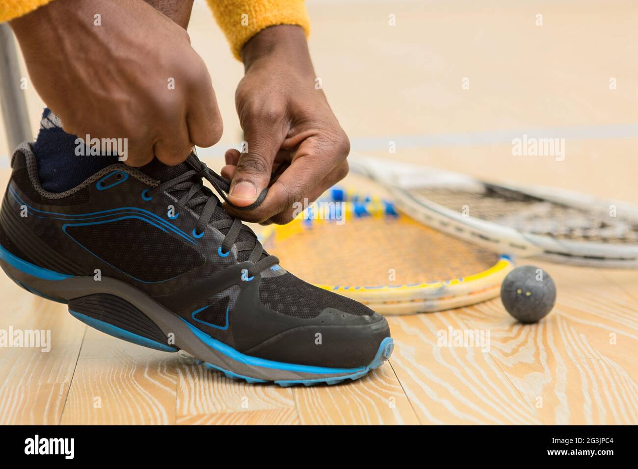 Squash player man Stock Photo - Alamy