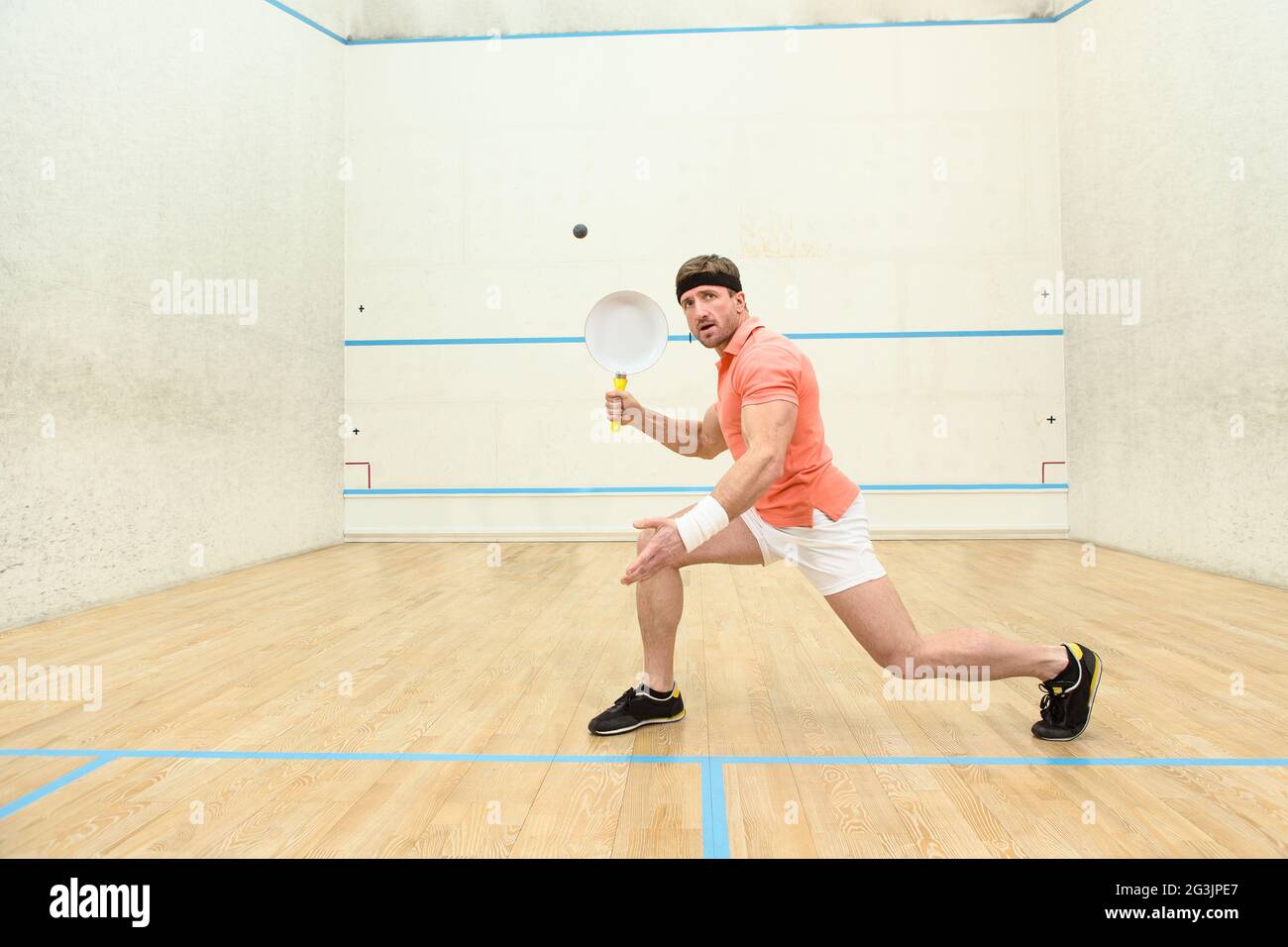 Squash player man Stock Photo - Alamy