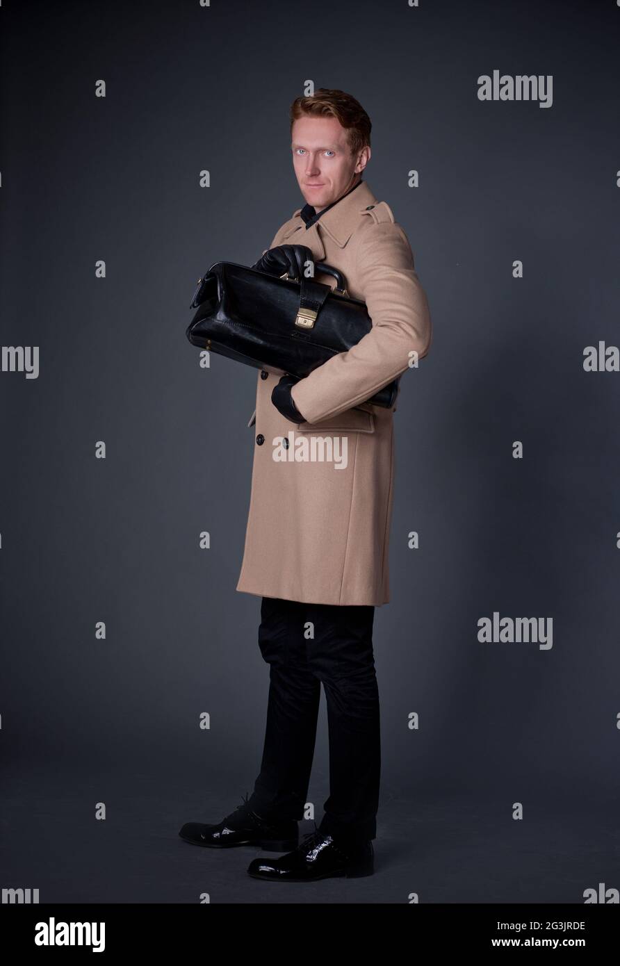 Man bag hi-res stock photography and images - Alamy