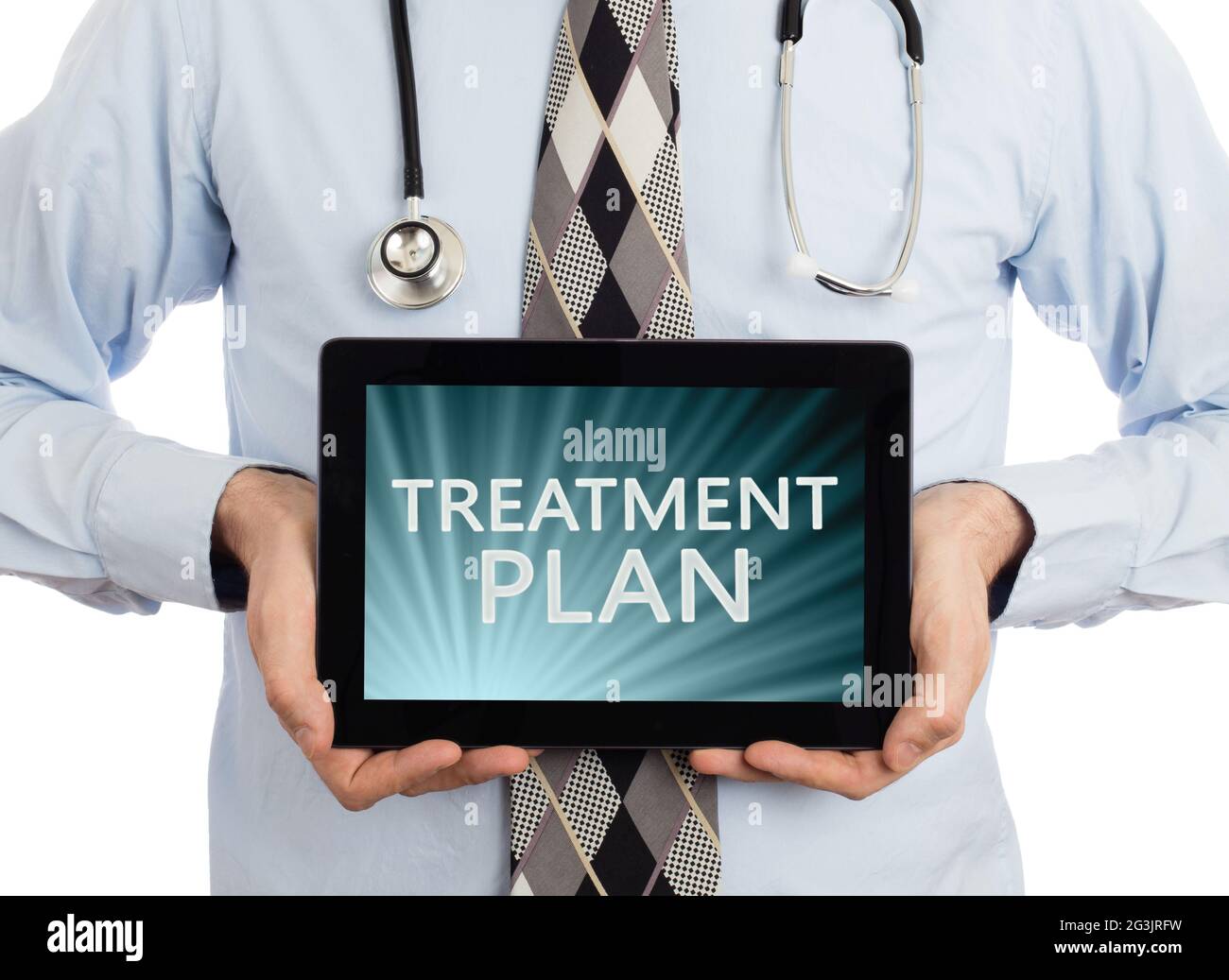 Doctor holding tablet - Treatment plan Stock Photo - Alamy