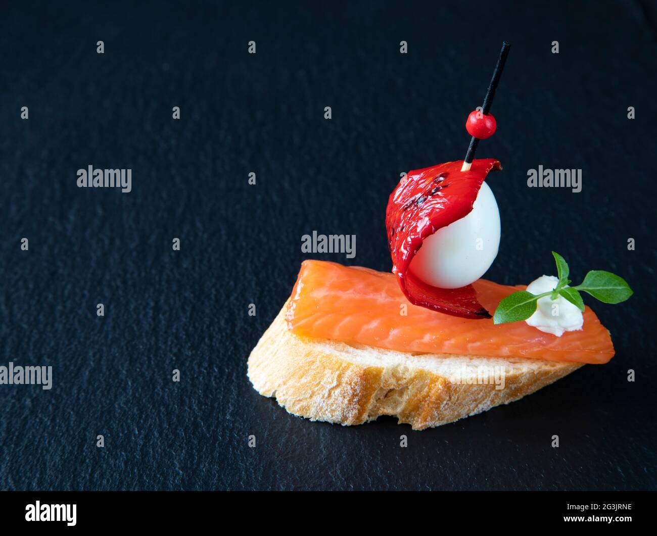 A beautiful creative sandwich is a traditional Spanish tapas snack. The ...