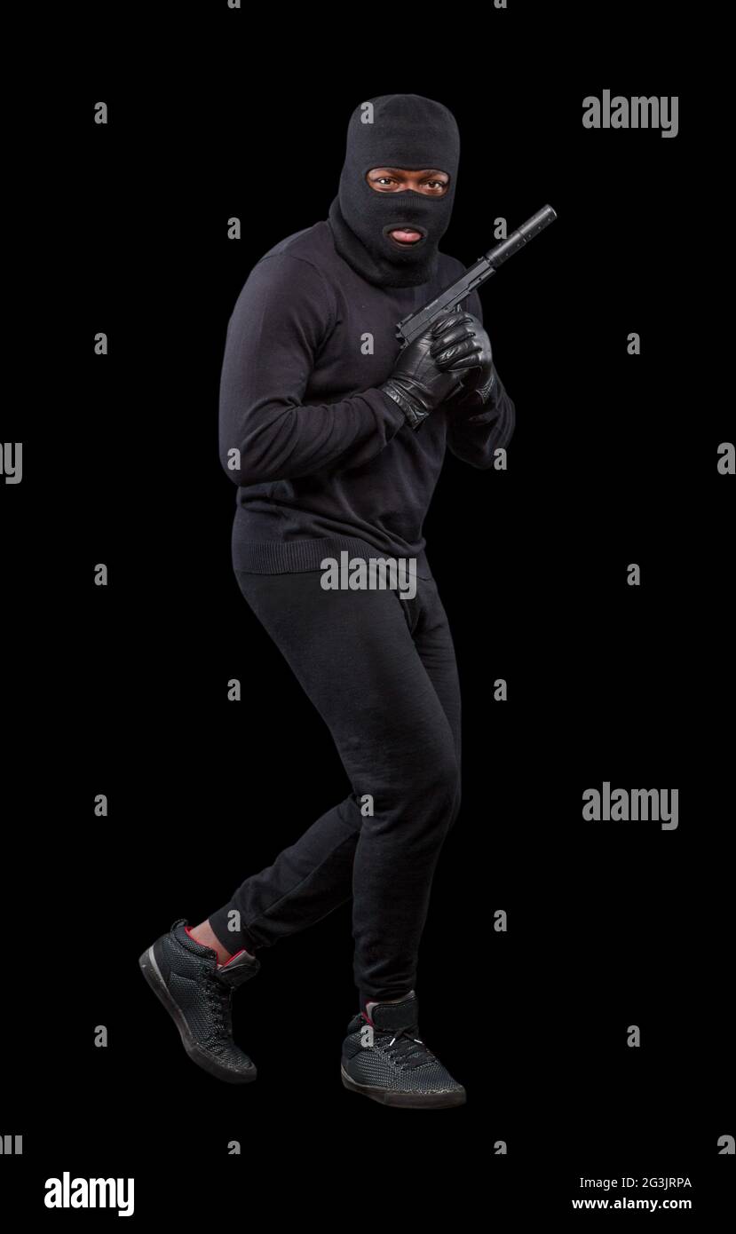 Masked man with gun hi-res stock photography and images - Alamy