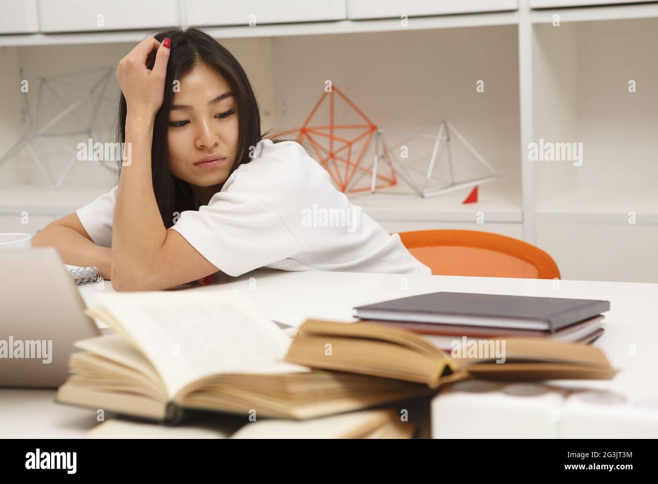 Tired Asian student Stock Photo - Alamy