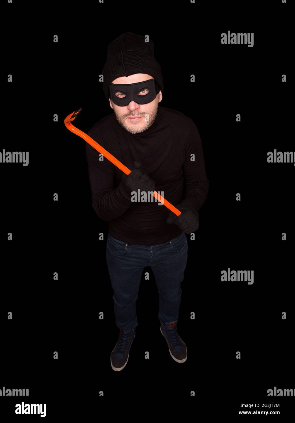 Masked burglar breaking house hi-res stock photography and images - Alamy