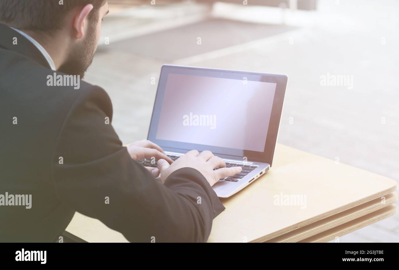 Businessman portrait using laptop hi-res stock photography and images ...