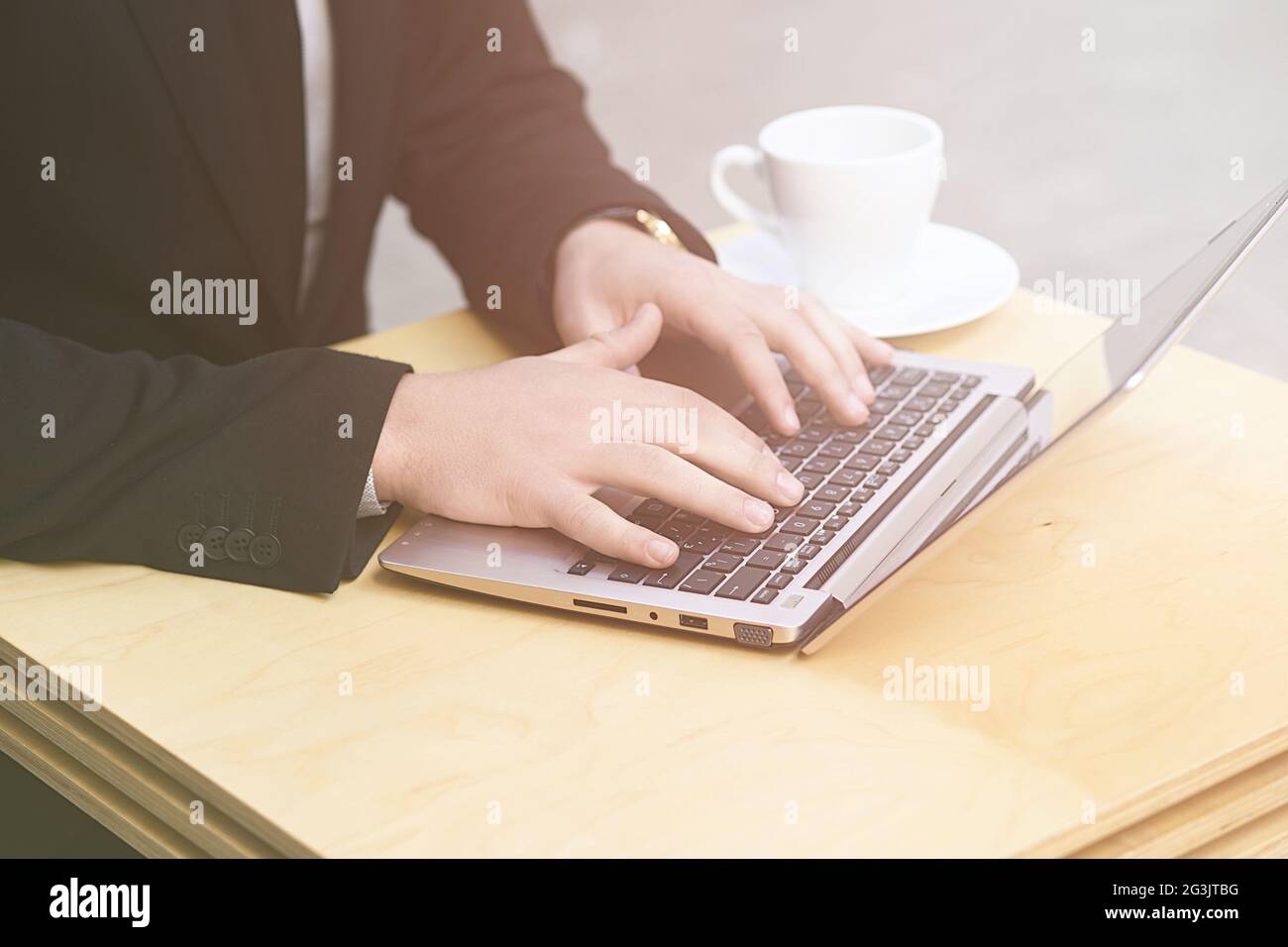 Person sitting using computer typing hi-res stock photography and ...