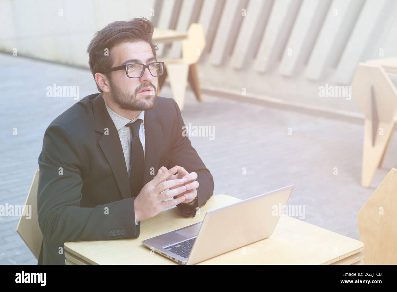 Businessman thinking laptop hi-res stock photography and images - Alamy