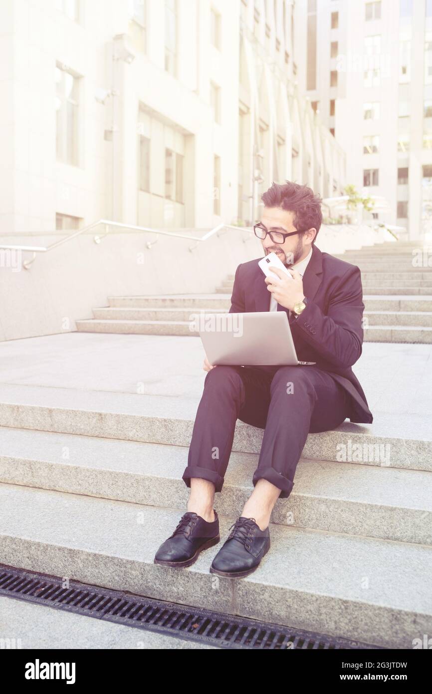 Professional man walking laptop computer hi-res stock photography and ...