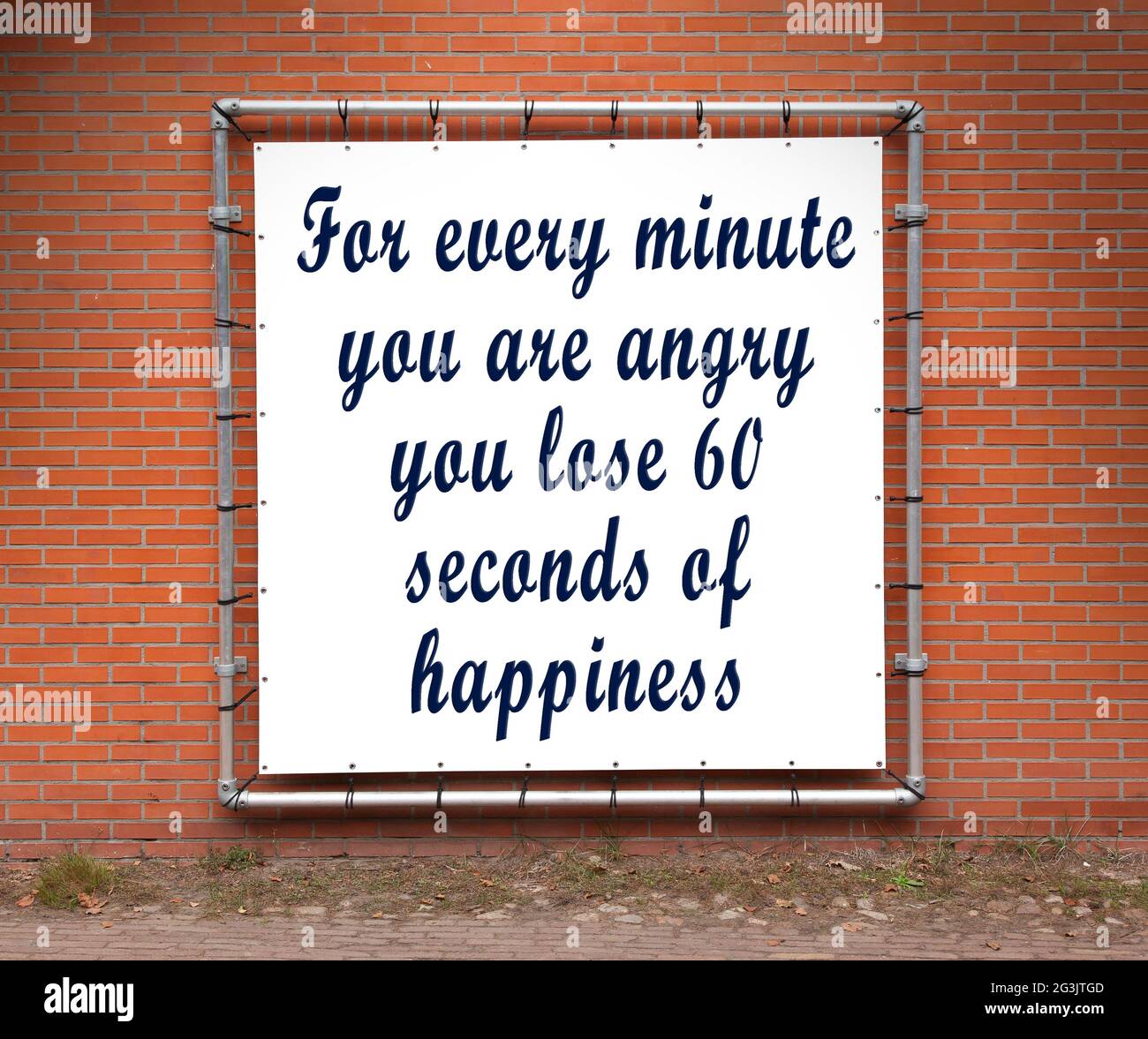 Large banner with inspirational quote on a brick wall Stock Photo - Alamy
