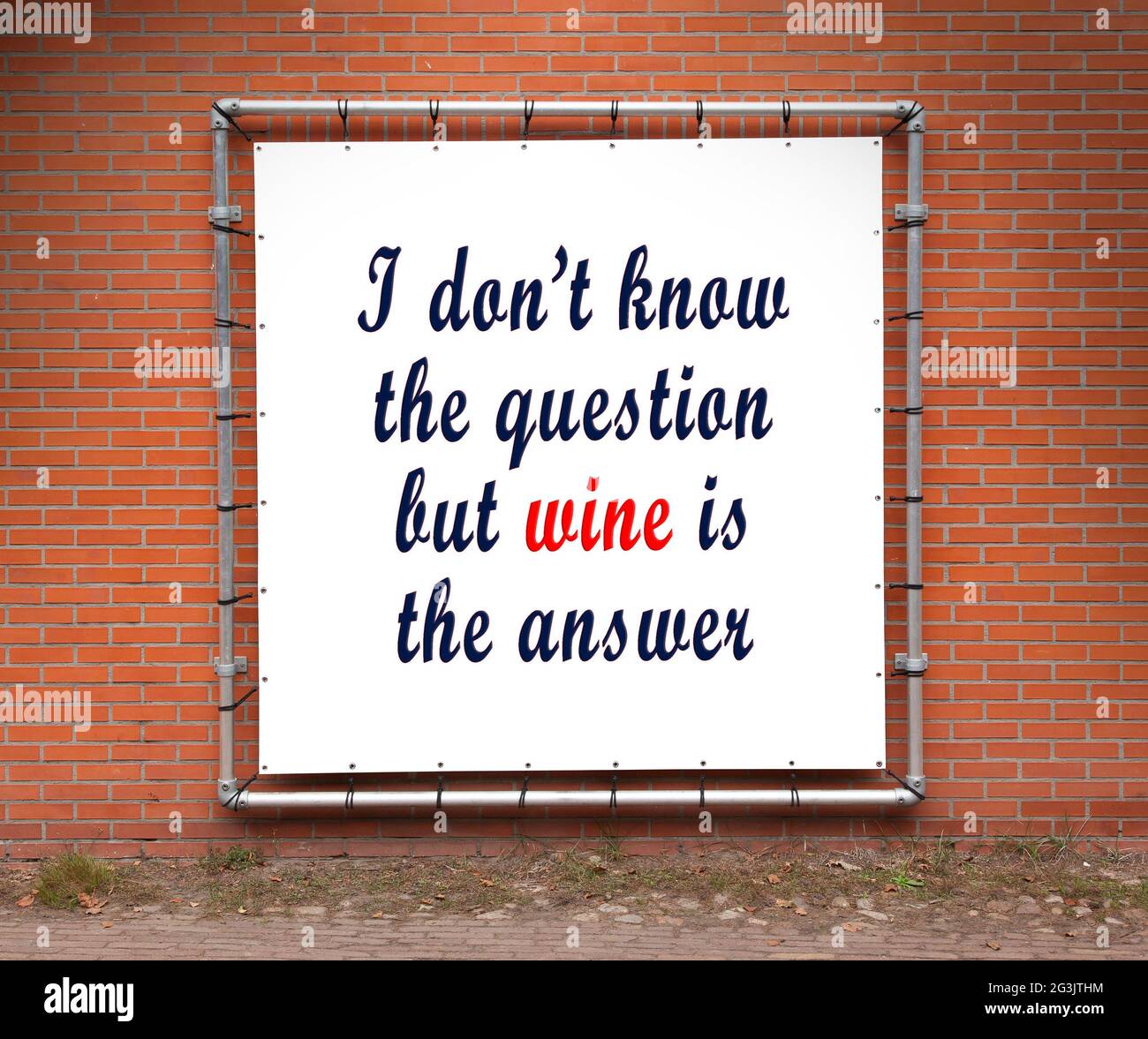 Large banner with inspirational quote on a brick wall Stock Photo - Alamy