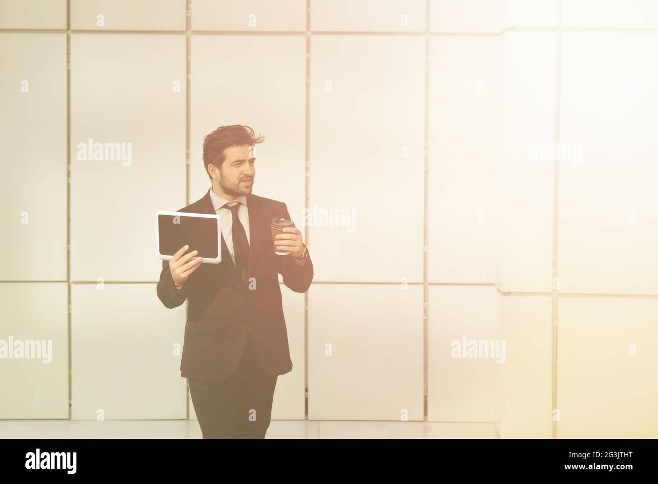 Walking with tablet hi-res stock photography and images - Alamy