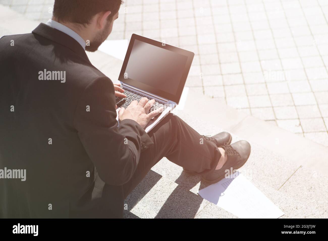 Professional man walking laptop computer hi-res stock photography and ...