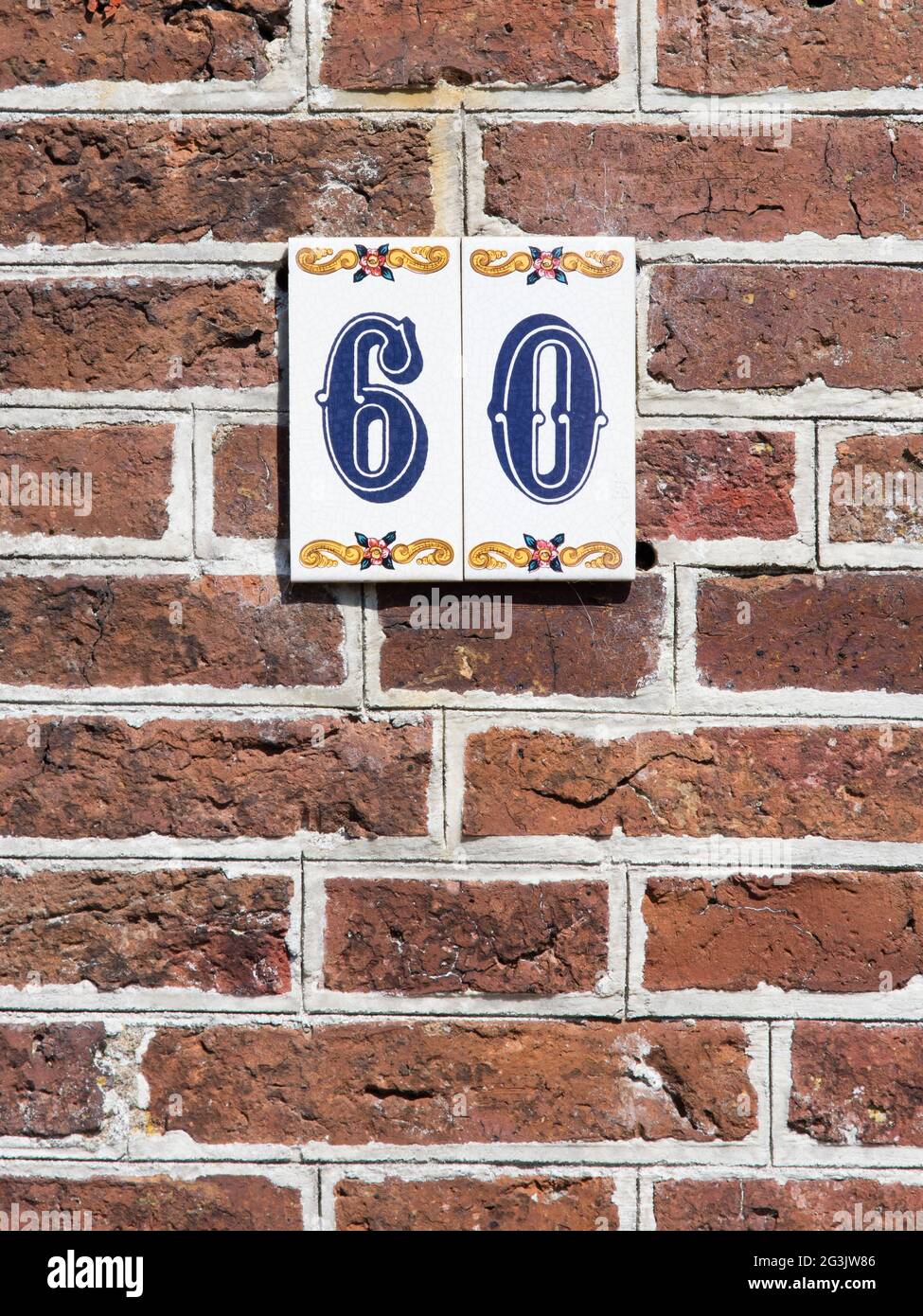 House number on a red brick wall in the Netherlands Stock Photo - Alamy