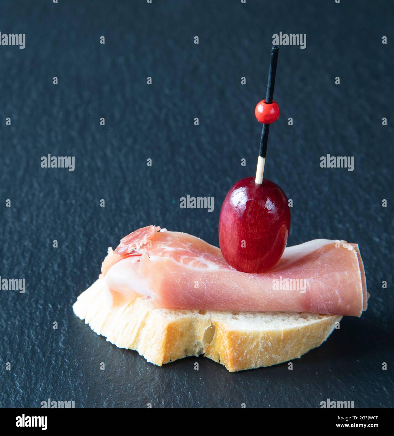 Spanish regional tapas sandwich - traditional jamon, white bread ...