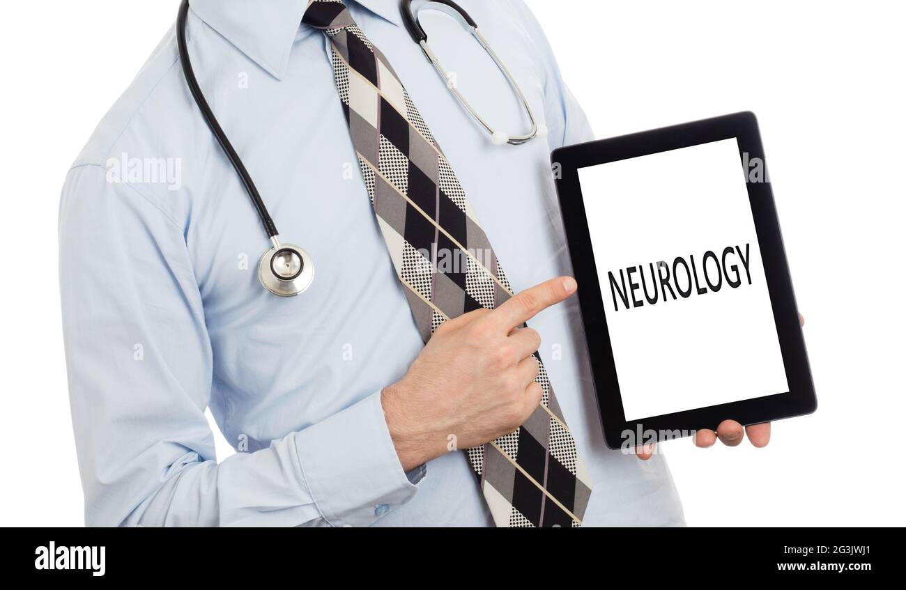 Doctor holding tablet - Neurology Stock Photo - Alamy