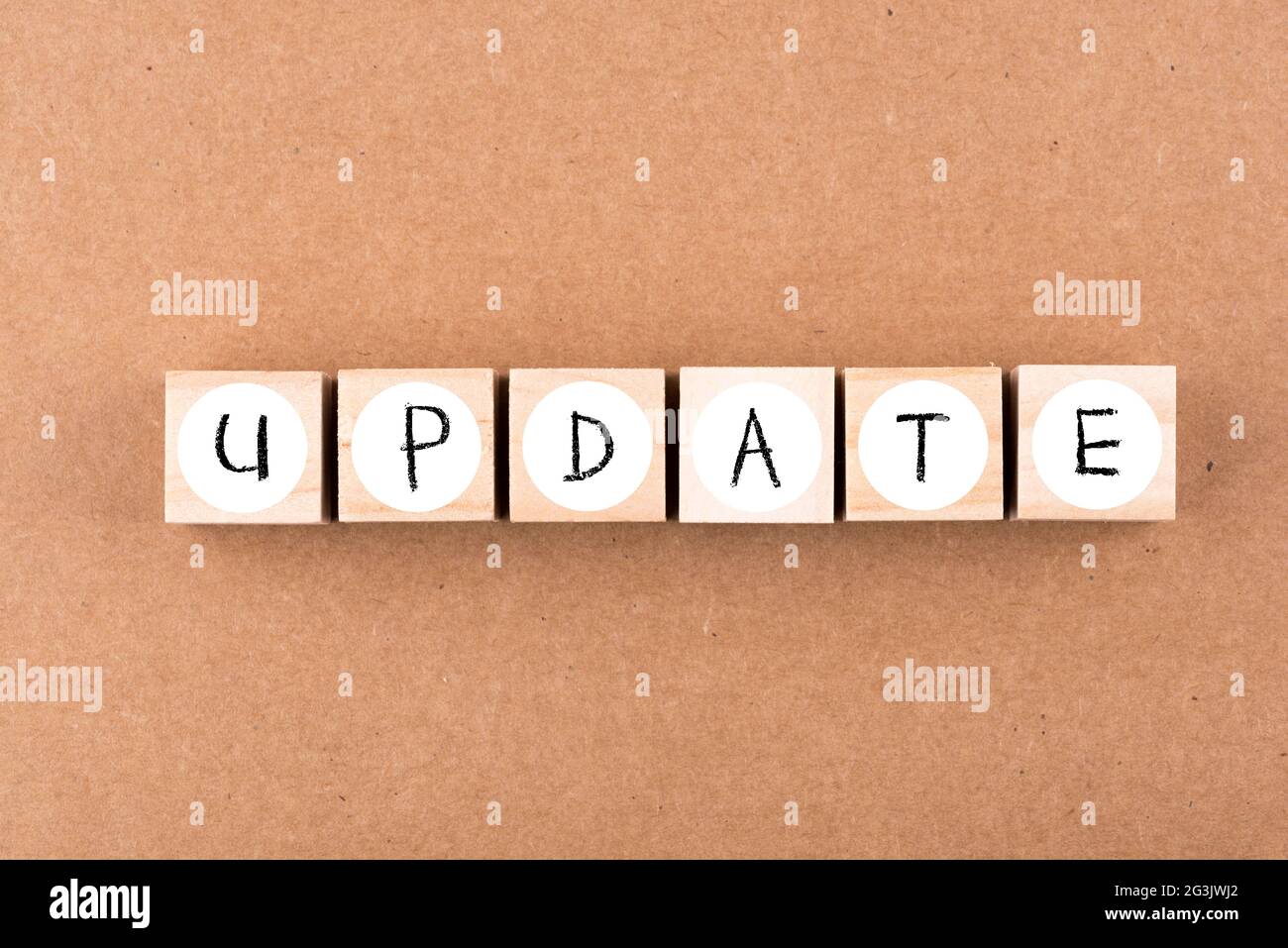 Illustration of dices with text UPDATE on brown background Stock Photo ...