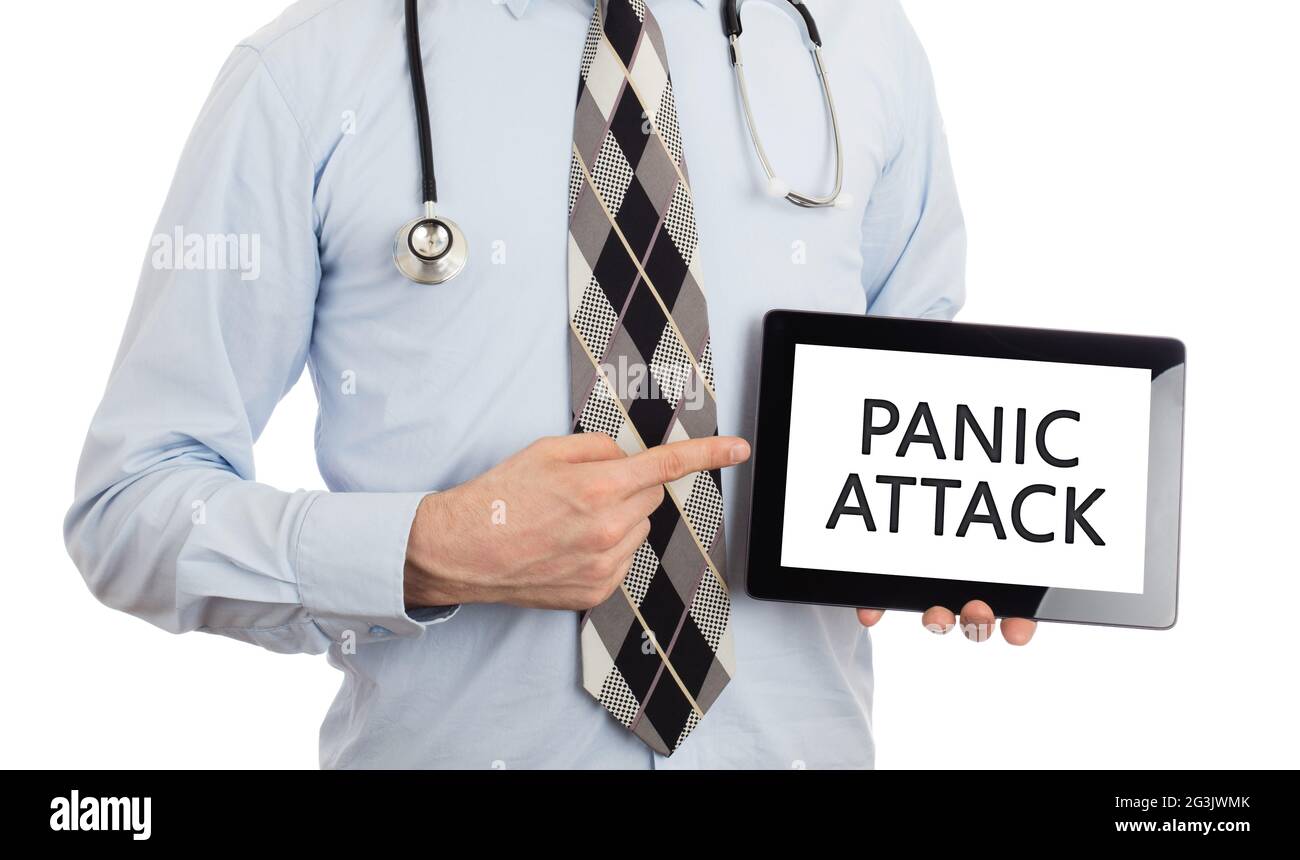 Doctor holding tablet - Panic attack Stock Photo - Alamy