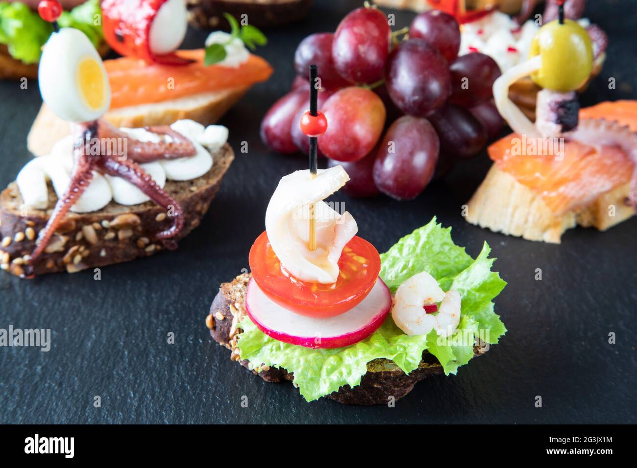 Sandwich in the form of a ship with sails - a traditional tapas of ...