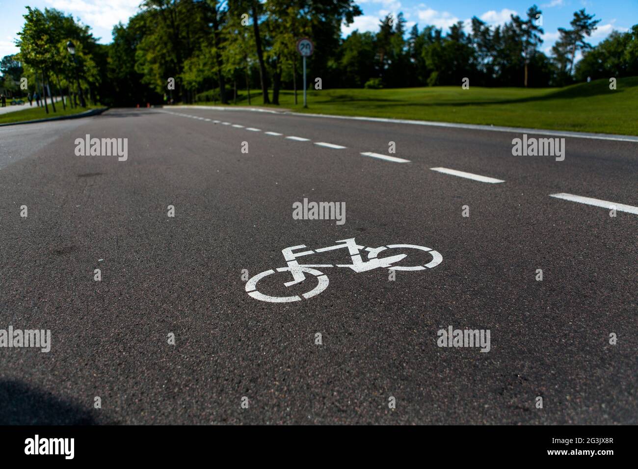 Bicycle road sign on road Stock Photo - Alamy