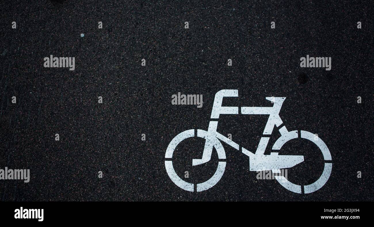 Bicycle road sign on road Stock Photo - Alamy