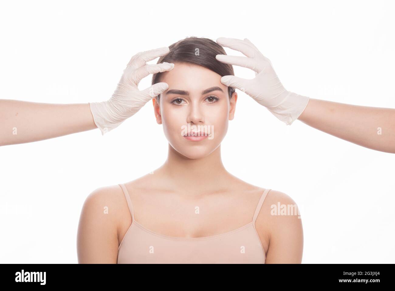Examining face concept Stock Photo - Alamy