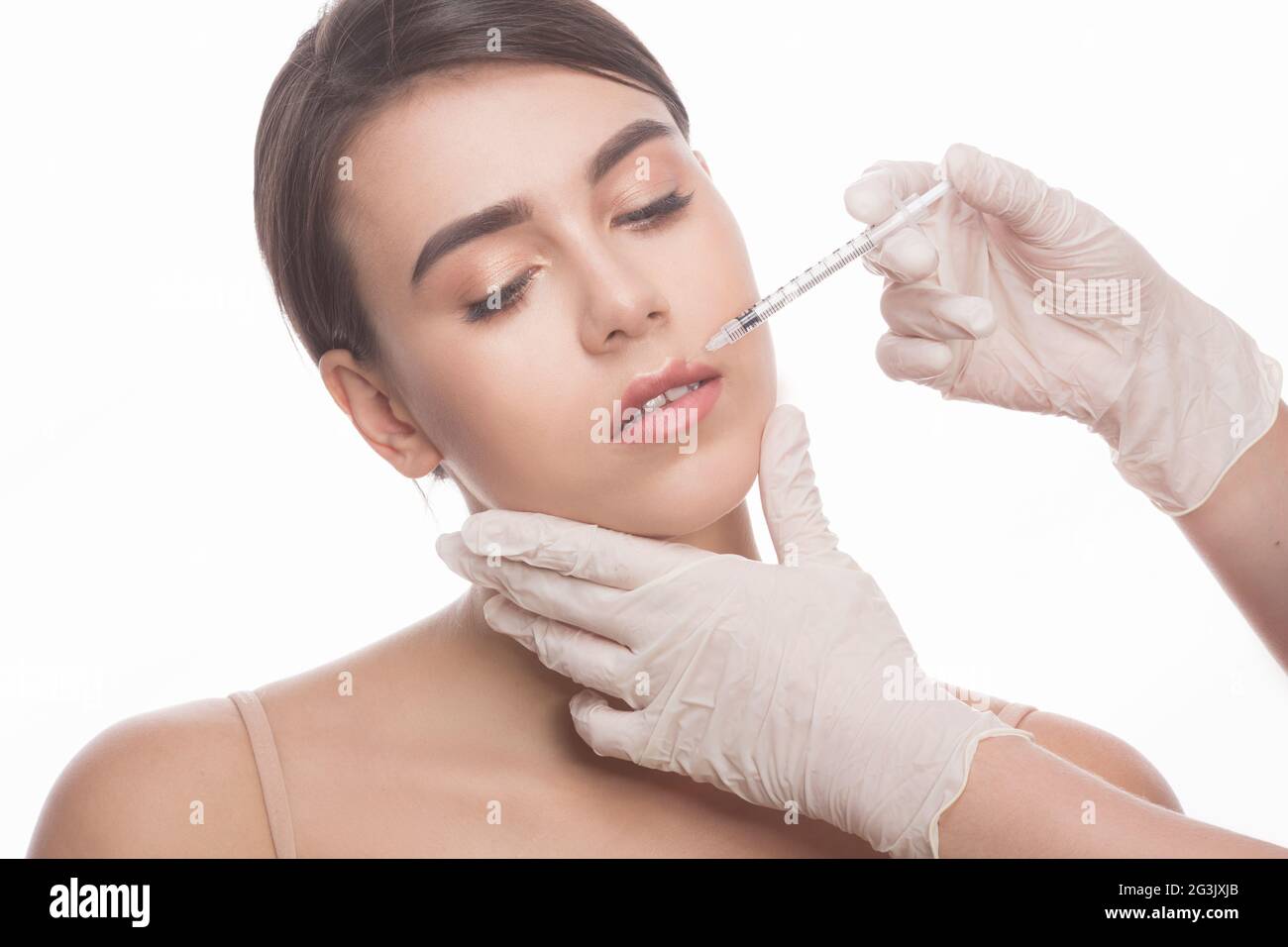 Woman getting beauty facial injections Stock Photo - Alamy